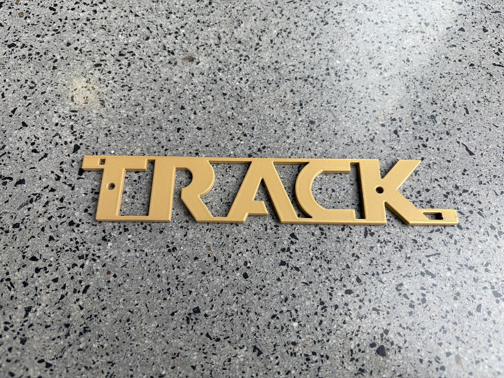 Track Logo - Bright Gold Pearl | Outback HQ – OutbackHQ Shop